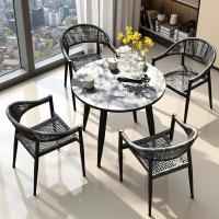 China Hot Sell Woven Rope Rattan Outdoor Stackable Wholesale Iron Frame Metal Patio Garden Dining Chair with Waterproof Cushion for sale