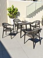 China Hot Sell Woven Rope Rattan Outdoor Stackable Wholesale Iron Frame Metal Patio Garden Dining Chair with Waterproof Cushion for sale