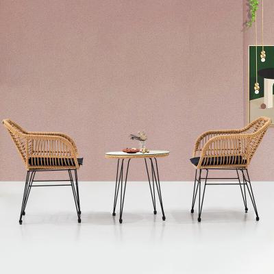 China New Outdoor Fashion Wicker Furniture Chair Restaurant Metal PE Rattan Dining Chair Dining Table Modern Kitchen Tables for sale
