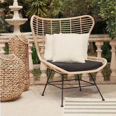 China Cheap Outdoor Furniture Garden Rope Weave PE Rattan Arm Dining Chair with Metal Legs Cushion Cafe Patio Outdoor Rattan Chair for sale