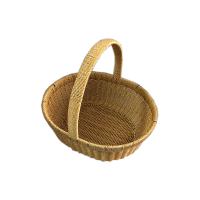 China Handmade Pastoral Large Oval Rattan Woven Storage Basket Kitchen Storage And Organization Accessories for sale