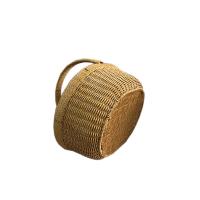 China Handmade Pastoral Large Oval Rattan Woven Storage Basket Kitchen Storage And Organization Accessories for sale