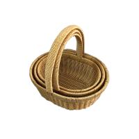 China Handmade Pastoral Large Oval Rattan Woven Storage Basket Kitchen Storage And Organization Accessories for sale
