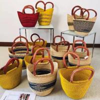 China Handmade Round Bags African Seagrass Bolga Baskets Colorful Ghana Woven Baskets Africa Straw Basket for sale