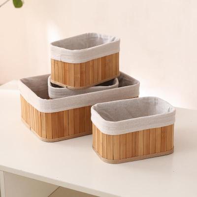 China Home Decorative Bamboo Rectangle Hand Woven Small Storage Basket with Eco-Friendly Handle for Laundry and Multi-Purpose Use for sale