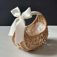 China Handwoven Picnic Fruit Basket With Ribbon Half Moon Rattan Storage Basket With Handle For Party Wedding Decor Flowers Container for sale
