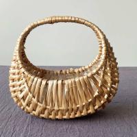 China Handwoven Picnic Fruit Basket With Ribbon Half Moon Rattan Storage Basket With Handle For Party Wedding Decor Flowers Container for sale