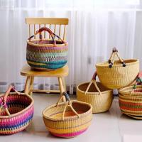 China Natural Straw Wicker Woven Round Seagrass Bolga Baskets Cheapest Wholesale Uk Clothing Organizer Storage Handmade Craft for sale