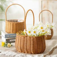 China Hot 100% Handmade Rattan Wicker Flower Gift Basket Storage Basket with Foldable Handle for Kitchen & Bathroom Home Decoration for sale