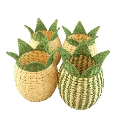 China Cute Woven Seagrass Pineapple Shaped Basket Storage Organization Wholesale Kids Baby Room Decor Round for sale