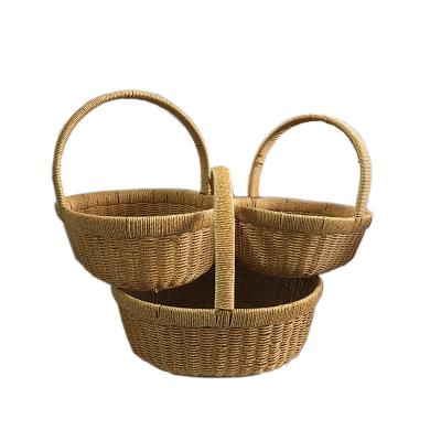 China Big Rattan Boho Cane Basket with Lid Custom Shape Eco Friendly Fruit Snacks Storage Basket for Outdoor Picnic Candle Holder for sale