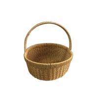 China Big Rattan Boho Cane Basket with Lid Custom Shape Eco Friendly Fruit Snacks Storage Basket for Outdoor Picnic Candle Holder for sale