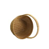 China Big Rattan Boho Cane Basket with Lid Custom Shape Eco Friendly Fruit Snacks Storage Basket for Outdoor Picnic Candle Holder for sale