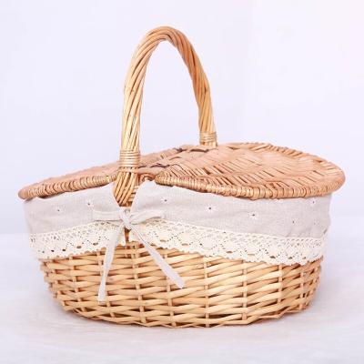 China Oval Handmade Durable Wicker Picnic Storage Basket Willow Woven Basket with Removable Washable Lining  for Kids Camping for sale