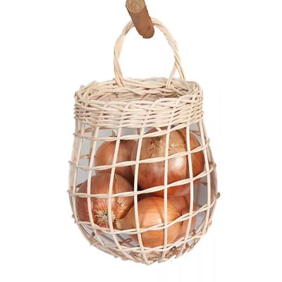 China Home Decoration Natural Wicker Rattan Wall Basket Onions Fruit Hanging Storage Basket for sale