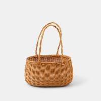 China Oval Shape Handle Flower Basket Indonesian Rattan Woven Mini Waterproof Picnic Basket for sale