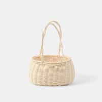 China Oval Shape Handle Flower Basket Indonesian Rattan Woven Mini Waterproof Picnic Basket for sale