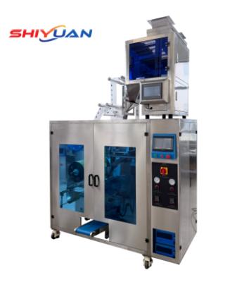 China Electronic scale triangular bag inner and outer bag packaging machine for sale