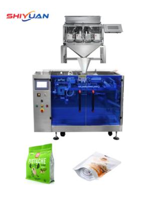 China 3L 4 Head Scale Premade Bag Packaging Machine with 5-18 Bags/min Speed and 100g-2.5Kg Weighing Range Doypack Packing Machine for sale