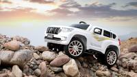 China 2.4GHz Remote Control Ride On Car with MP3 Open Doors Kids Electric Car 12V7AH 4 Motor for sale