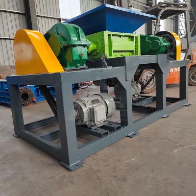 China Double Shaft Shredder for Recycling Cardboard Boxes Plastic Bottles and Scrap Metal for sale