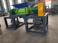 China Double Shaft Shredder for Recycling Cardboard Boxes Plastic Bottles and Scrap Metal for sale