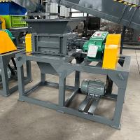 China 50kW Double Shaft Shredder for Wooden Pallets and Scrap Metal/Plastic Conveyor System for sale