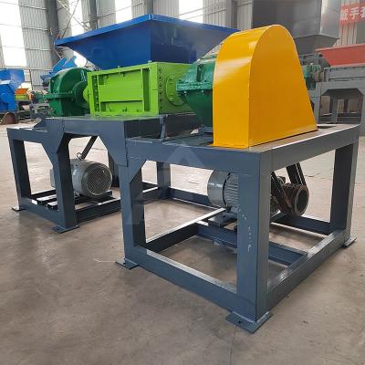 China Double Shaft Shredder Machine for Scrap Plastic Bottle Metal and Cardboard Waste for sale