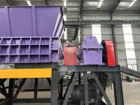 China 2000 Double Shaft Shredder for Aluminum Cans Scrap Metal Rubber PVC Plastic Bottles for sale
