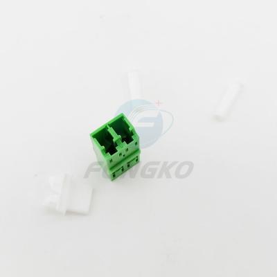 China LC APC Duplex Plastic Buckle Optic Fiber Adapter With Metal Shrapnel Flangeless for sale