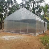 China Cheap Good Price Plastic Film Tropical Tunnel House Single-Span Sawtooth Top Vent Greenhouse For Sale for sale