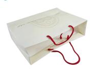 China Recyclable Stone Paper Bag 100% Tree Free Customized with handle for sale