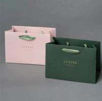 China Carrier Bags Handle Bag Stone Paper Packaging CMYK Color for sale