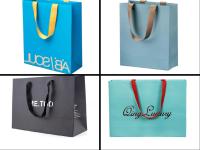 China Recycled Print Folding Paper Packaging Die Cutting Kraft Paper Gift Bags for sale
