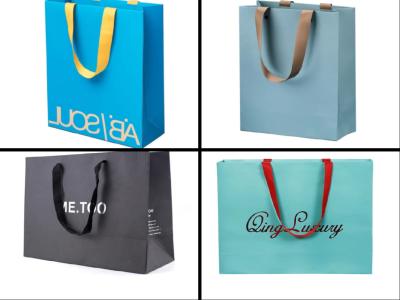 China Recycled Print Folding Paper Packaging Die Cutting Kraft Paper Gift Bags for sale