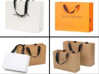 China Recycled Print Folding Paper Packaging Die Cutting Kraft Paper Gift Bags for sale