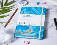 China CMYK Color Printing Stone Paper Notebook with Saddle Stitch Binding Matte Lamination for sale