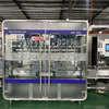China 4000BPH 60HZ Servo Shampoo Shower Gel Bottle Filling Machine Package Line for sale
