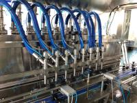 China SS316 PLC Control Capper Wet Glue Paper Label Bottle Oil Filling Machine For Edible Oil for sale