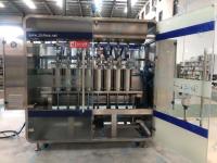 China 4kw Plastic Bottle Filling Machine 1000ml Dishwasher Inline Bottle Filler for sale