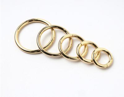 China Rust Resistant Spring O Rings Alloy Trigger Round Snap Buckle For Dog Leashes Luggage Belt for sale