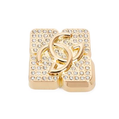 China “Two G”Shape With Shiny Industry Transparent Crystal Particles Lock For Handbag Hardware Accessories for sale