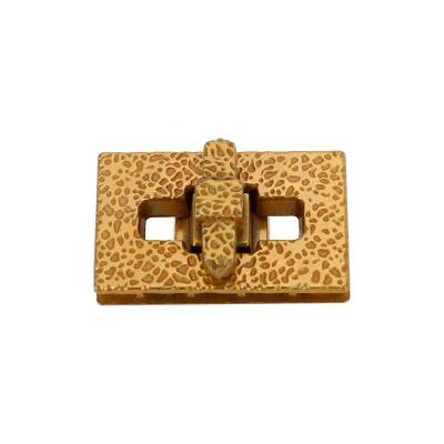 China Corrosion Decoration Twist Handbag Lock Hardware Matte Gold Surface for sale