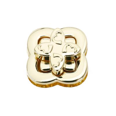 China Four Leaf Clover Twist Handbag Lock Hardware Bag Replacement Parts for sale