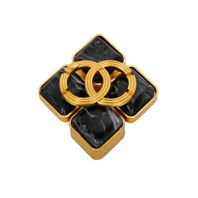 China Reusable Handbag Lock Hardware Black And Gold Four Leaf Clover Double Ring for sale