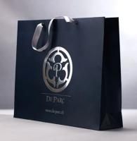 China Luxury Black Paper Apparel Packaging Gift Shopping Bag Customized Branded Logo for sale