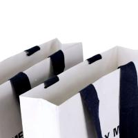 China Recyclable Disposable White Kraft Paper Shopping Bags For Clothes for sale
