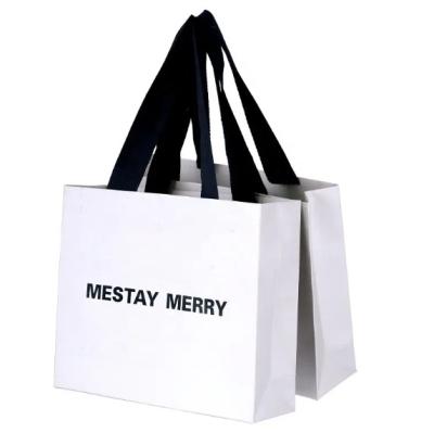 China Recyclable Disposable White Kraft Paper Shopping Bags For Clothes for sale