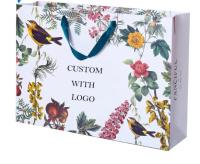 China Herringbone Ribbon Handle Boutique Custom Paper Shopping Bag for sale