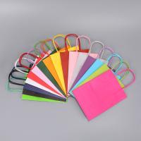 China Reusable  flat bottom paper bags christmas paper gift bags paper twist handle bags for sale